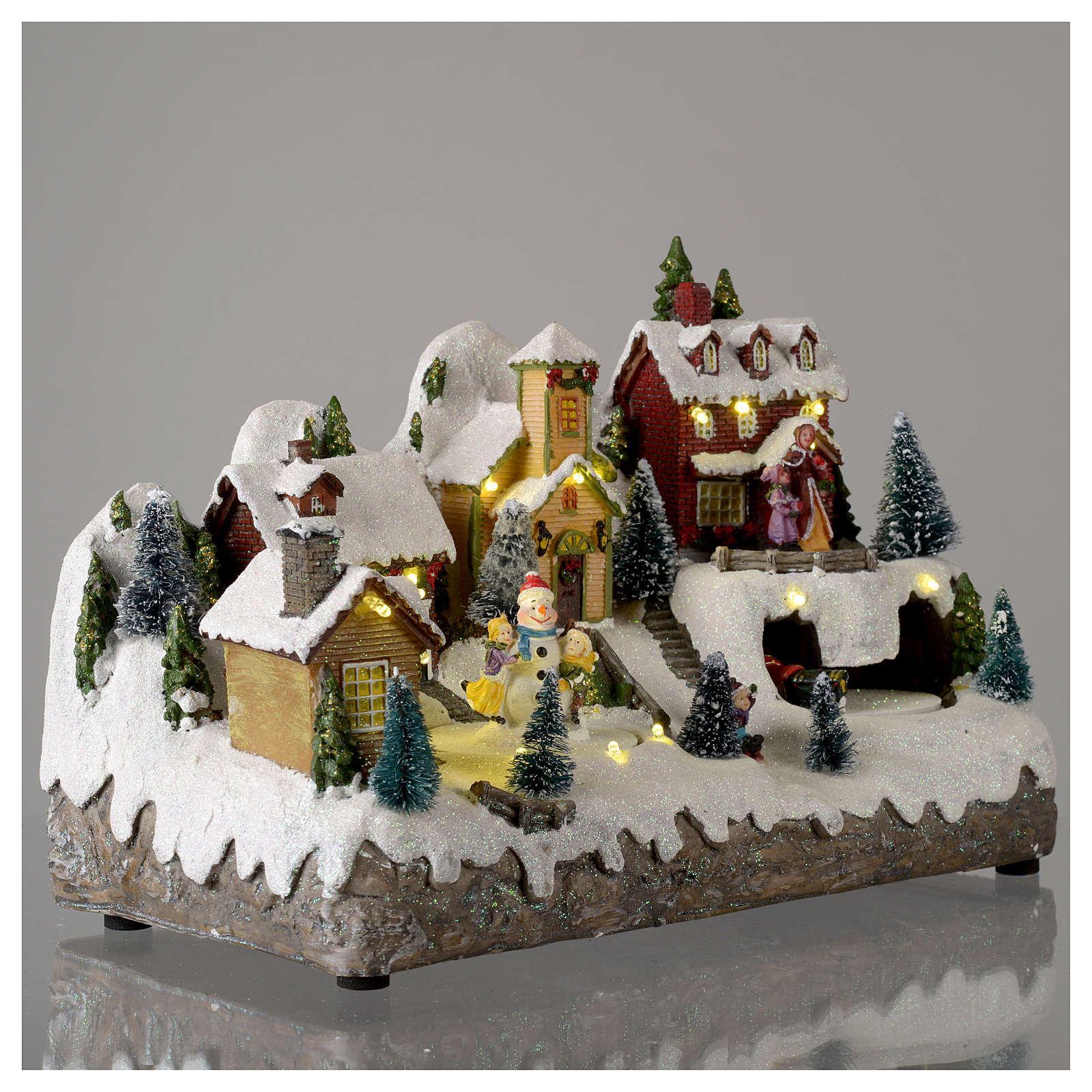 Christmas village with moving snowman 25x35x15 cm | online sales on ...