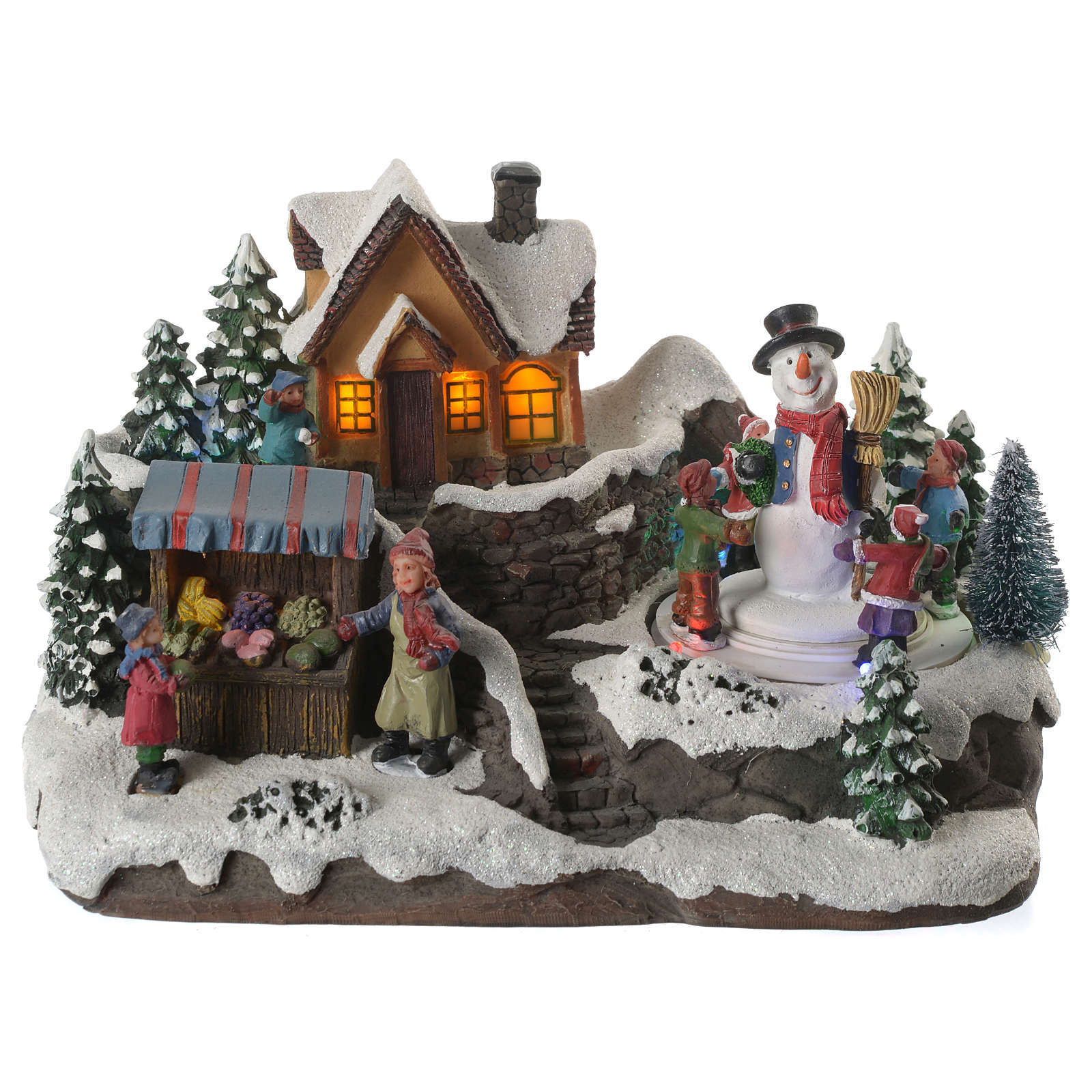 Illuminated Christmas village with snowman and turning tree | online ...