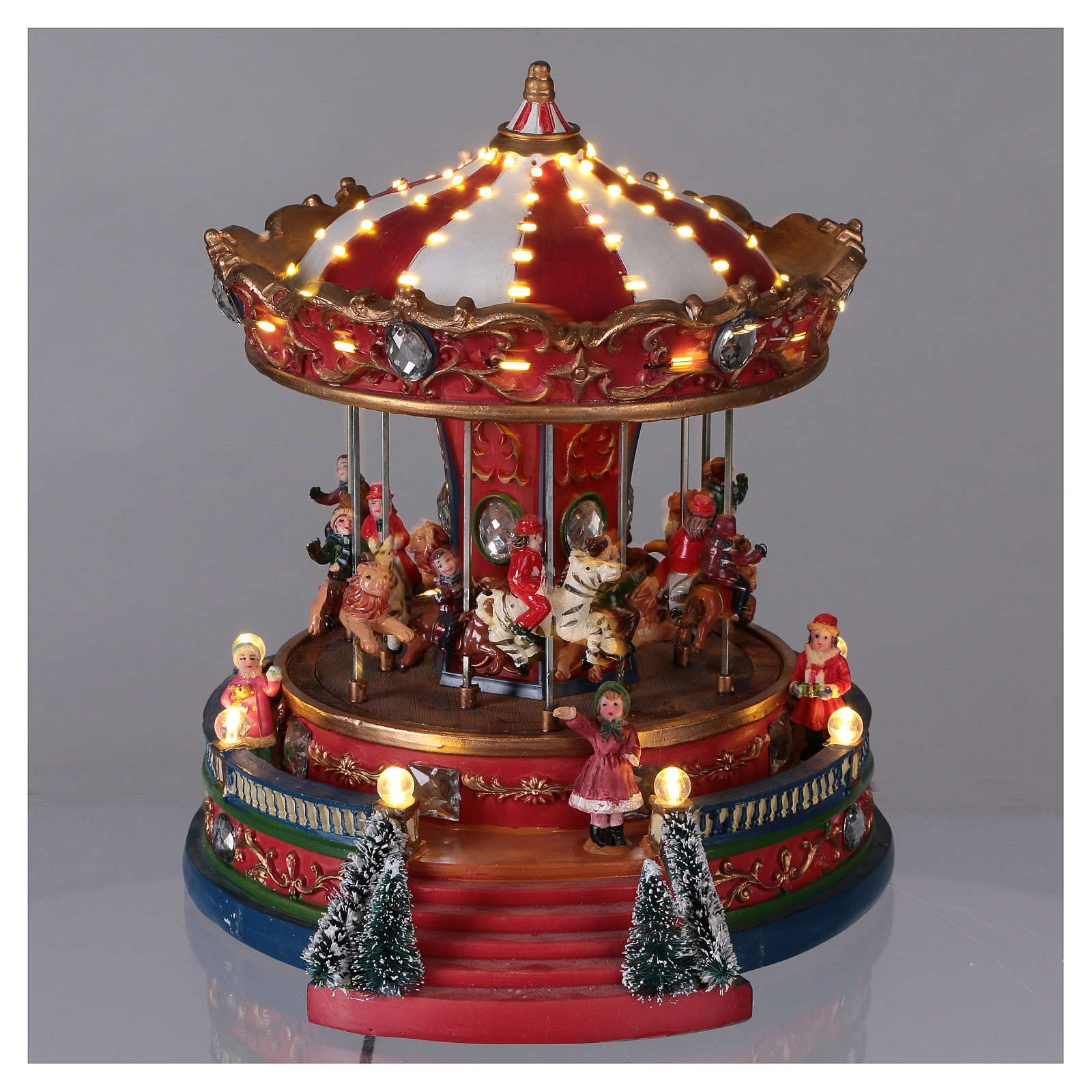 Lighted Christmas Village with moving merry-go-round with | online ...